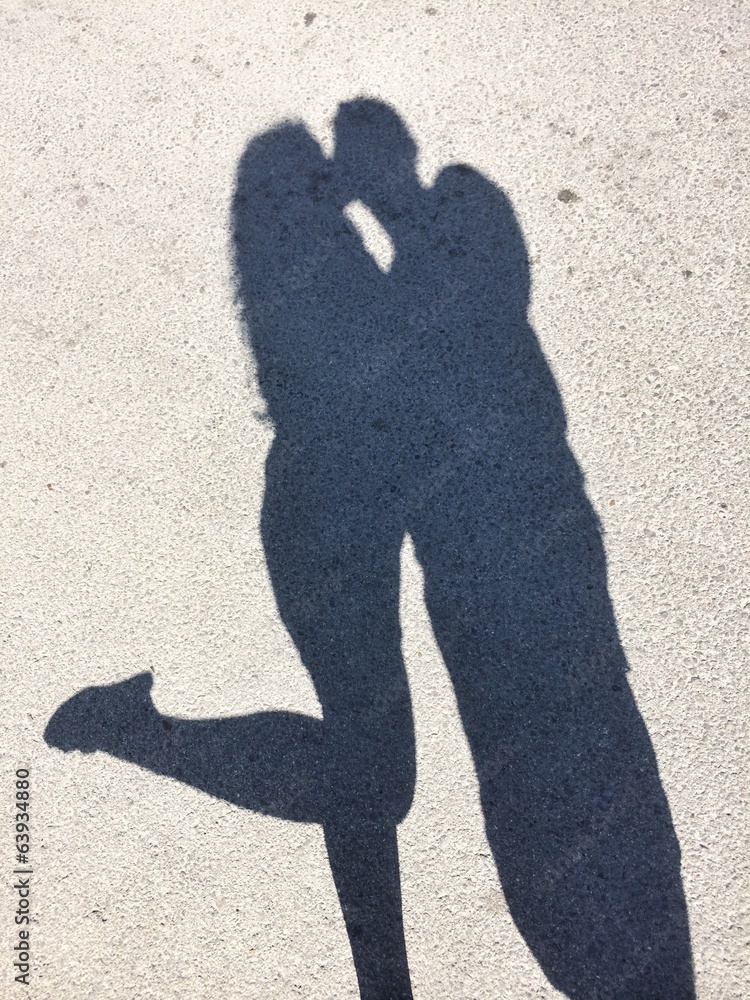The shadow of a girl kissing a boy Stock Photo | Adobe Stock