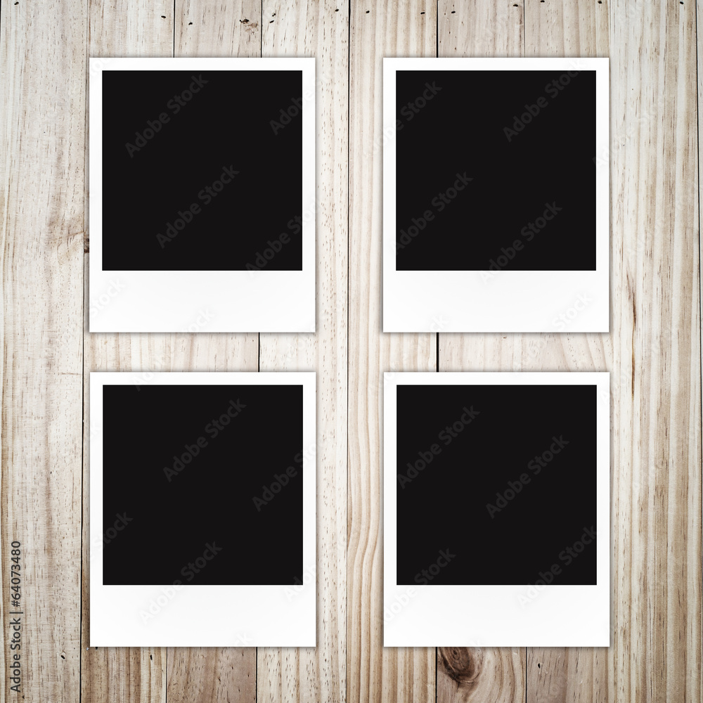 Polaroid photo frame on wood background Stock Photo | Adobe Stock
