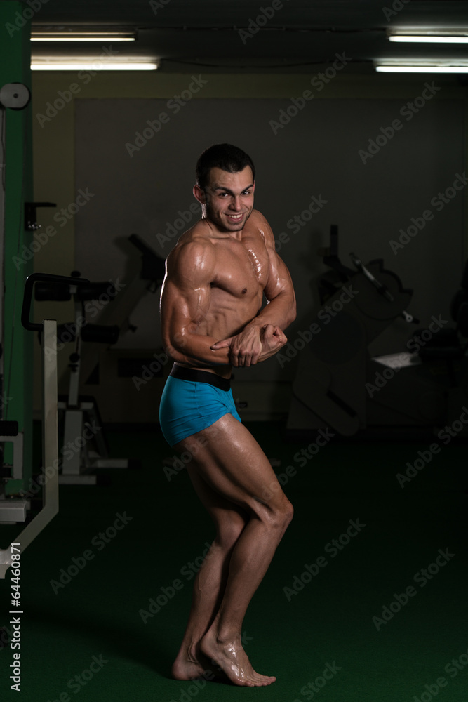 Bodybuilder Performing Side Chest Poses Stock Photo | Adobe Stock