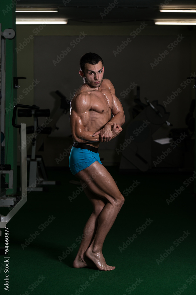 Bodybuilder Performing Side Chest Poses Stock Photo | Adobe Stock