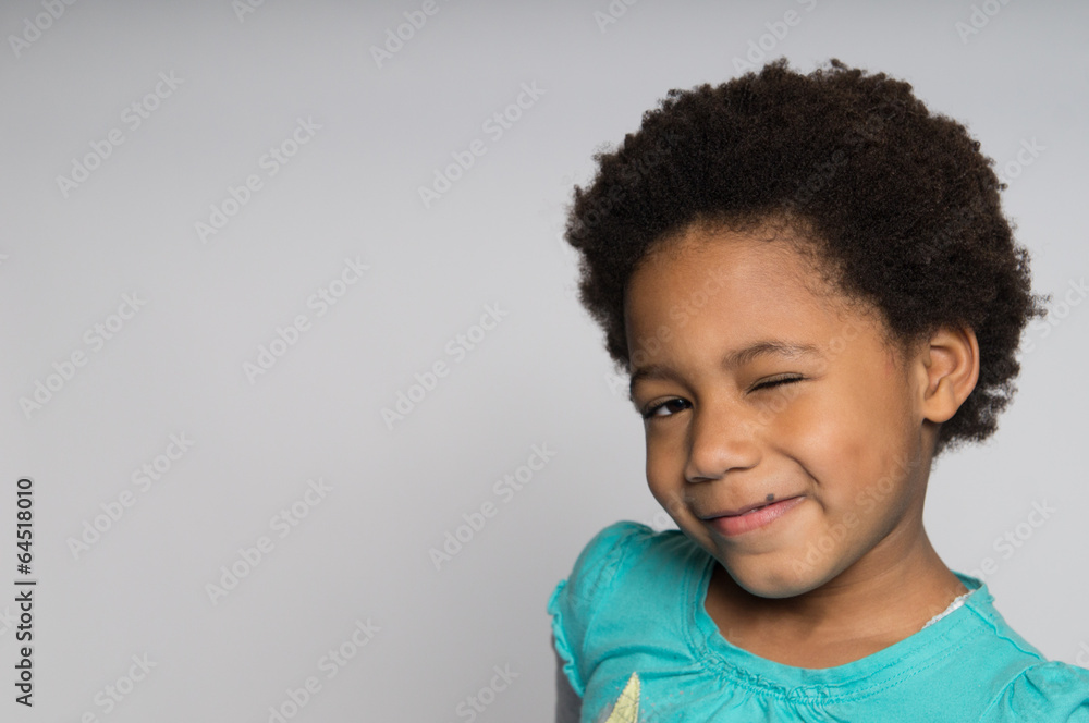 Winking child Stock Photo | Adobe Stock