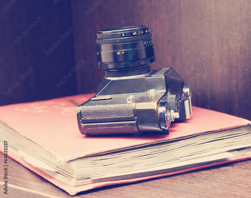 Vintage camera and album for photos, instagram retro effect Stock Photo ...