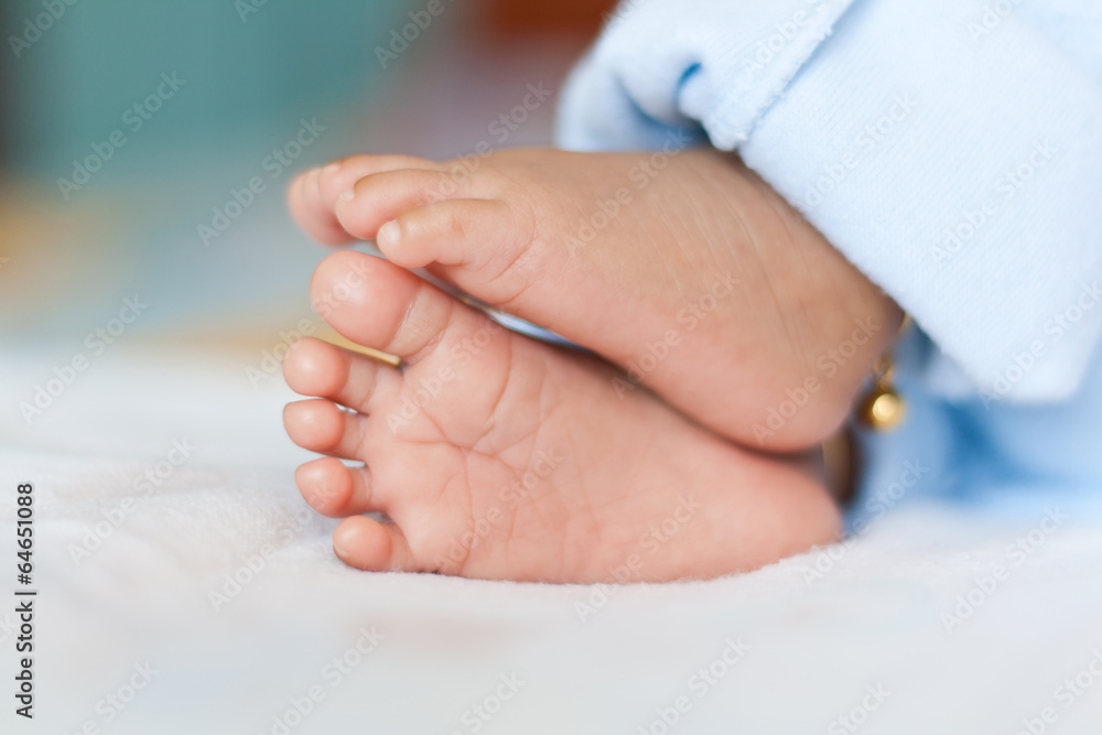 Newborn baby feet on white background Stock Photo | Adobe Stock