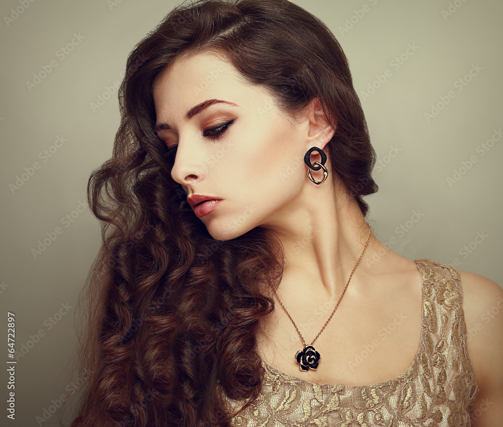 Beautiful profile of female model looking with long curly hair Stock ...