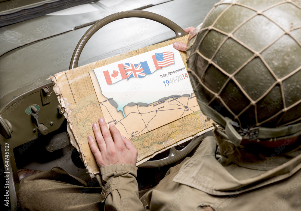 driver of a military vehicle look at a map of Normandy Stock Photo ...