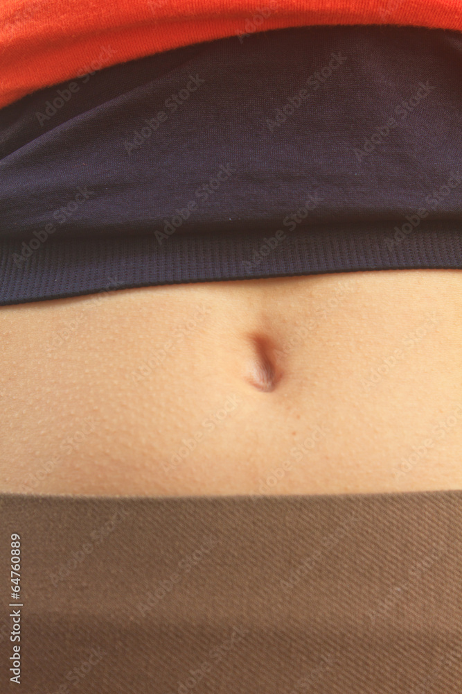 navel of the stomach of woman Stock Photo | Adobe Stock