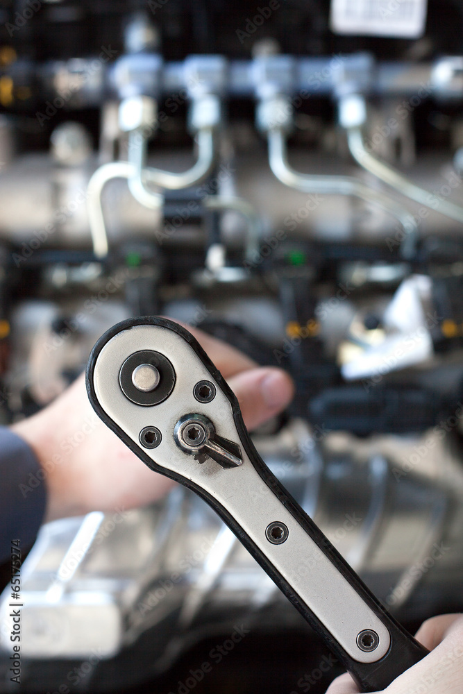 automotive mechanic tightening using a torque wrench Stock Photo ...