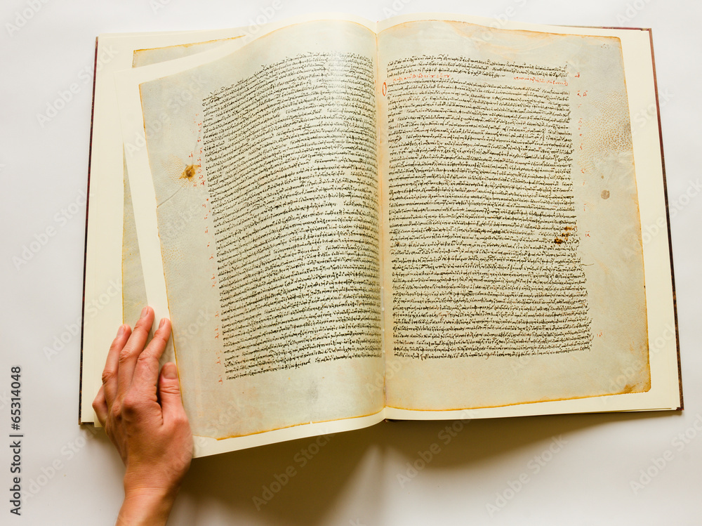 Hands turning pages of vintage book with handwritten text Stock Photo ...