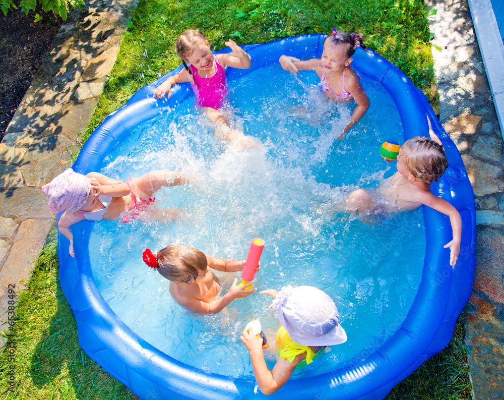 children in swimming pool Stock Photo | Adobe Stock