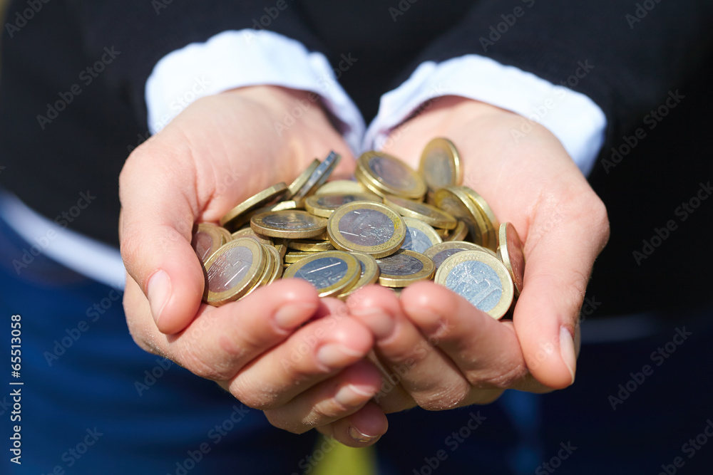 coins in the hand Stock Photo | Adobe Stock