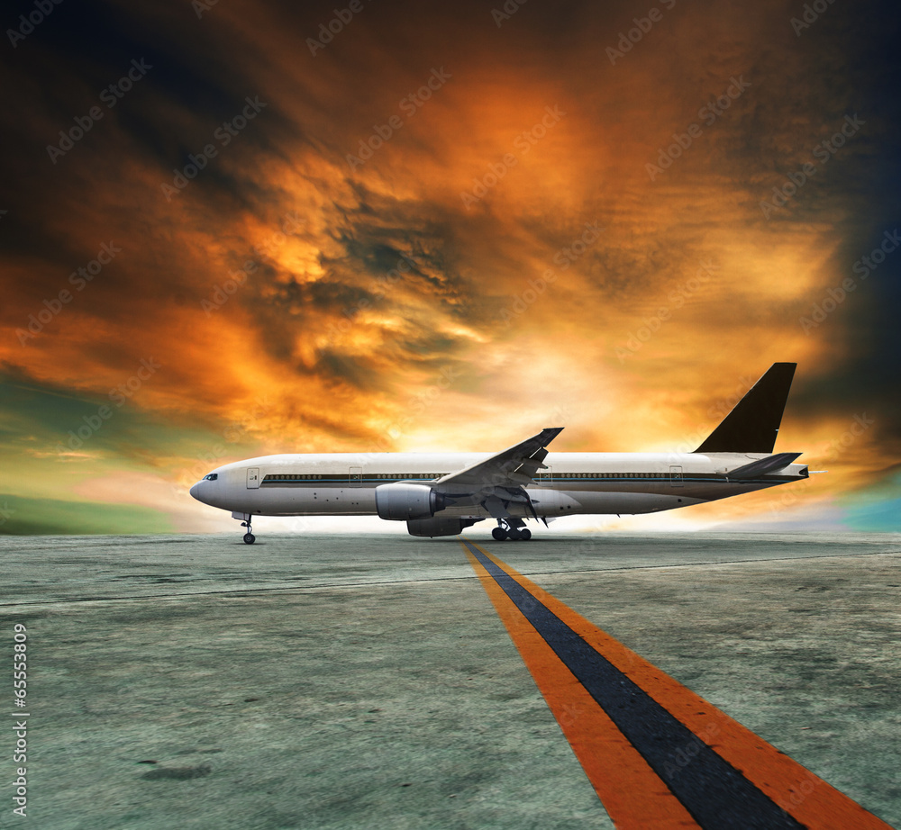 jet plane flying over runways and beautiful dusky sky with copy Stock ...