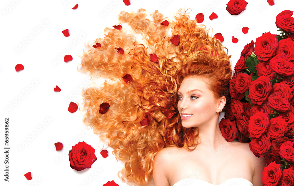 Beauty model girl with curly red hair and beautiful red roses Stock ...