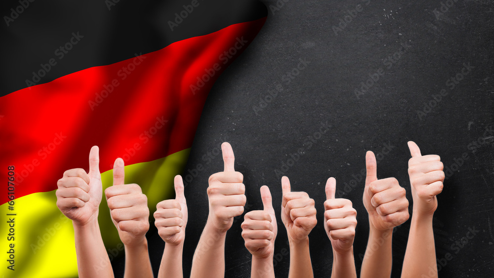 Daumen-Hoch-Gesten vor Deutschlandfahne Stock 写真 | Adobe Stock