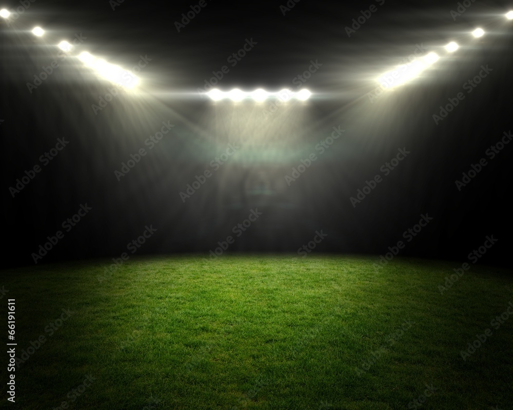 Football pitch under bright spotlights Stock Photo | Adobe Stock