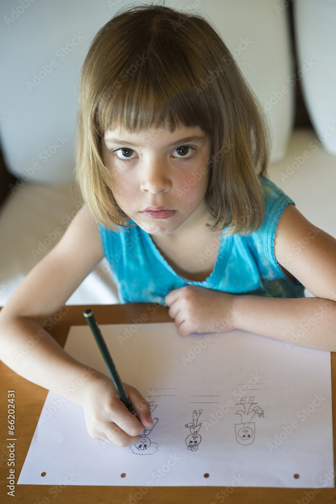 Little girl drawing Stock Photo | Adobe Stock
