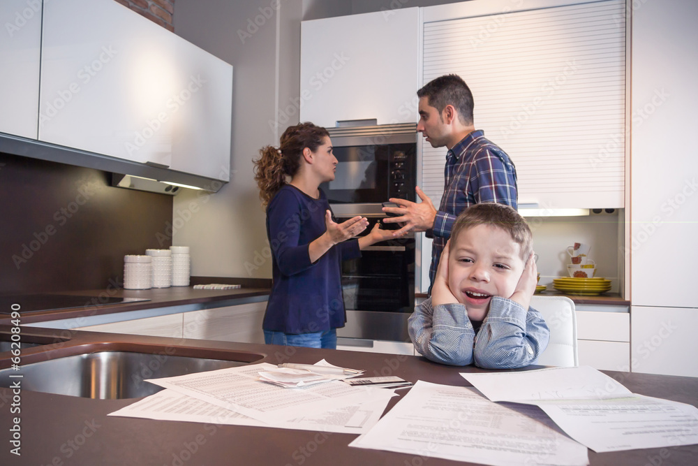 Sad child suffering and parents having discussion Stock Photo | Adobe Stock