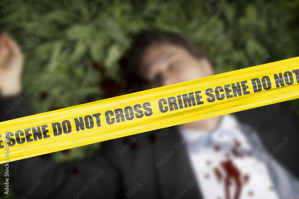 Yellow crime scene cordon tape over a body of a man Stock Photo | Adobe ...