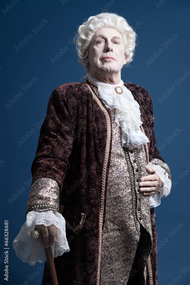Retro baroque man with white wig standing with walking stick arr Stock ...