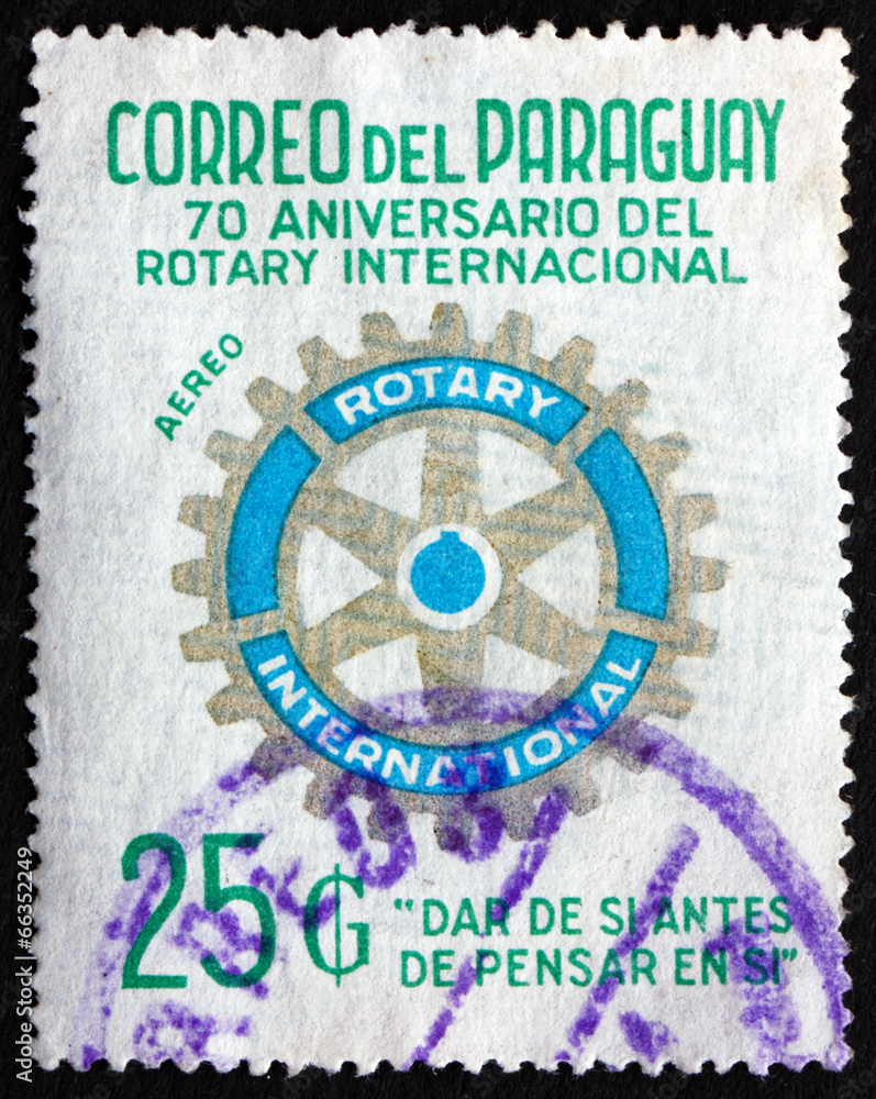 Postage stamp Paraguay 1976 Rotary International Symbol Stock Photo ...