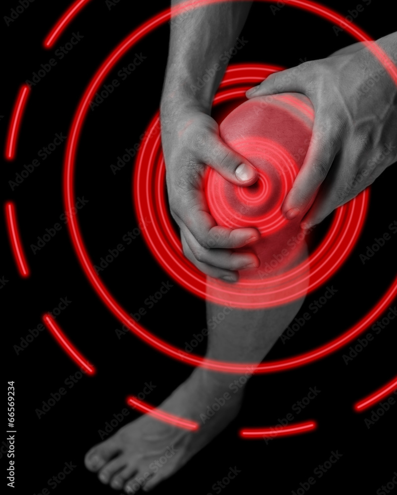 Pain in the male knee joint, pain area of red color Stock Photo | Adobe ...