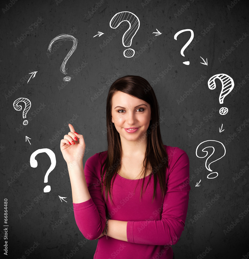 Young woman thinking with question mark circulation around her h Stock ...