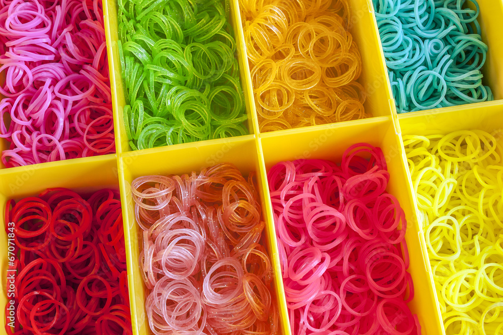 Colorful Rainbow loom rubber bands in a box Stock Photo | Adobe Stock