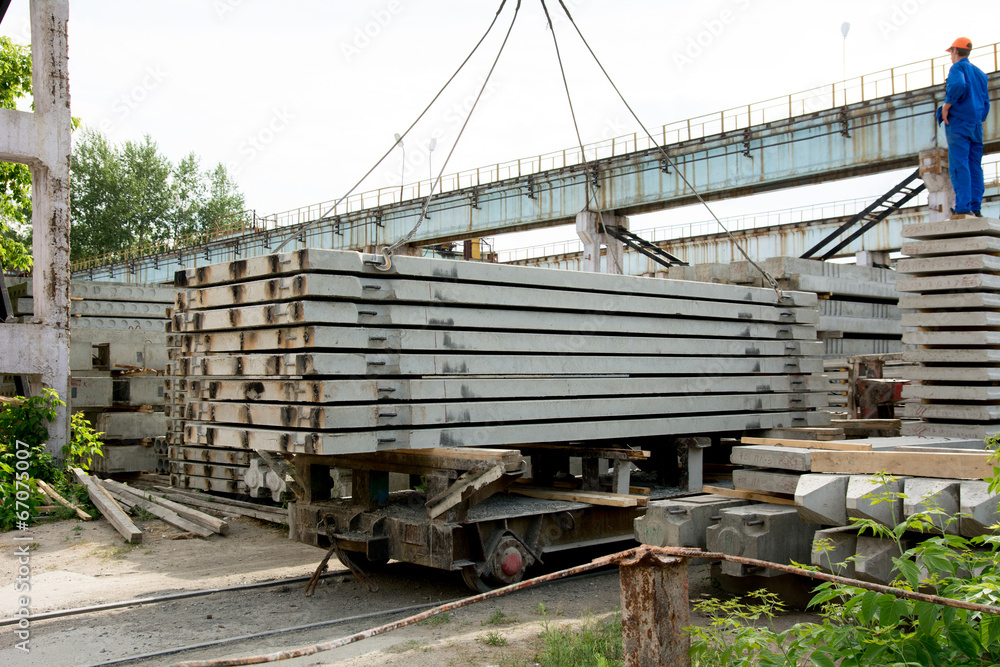 Handling of concrete slabs on a railway platform Stock Photo | Adobe Stock