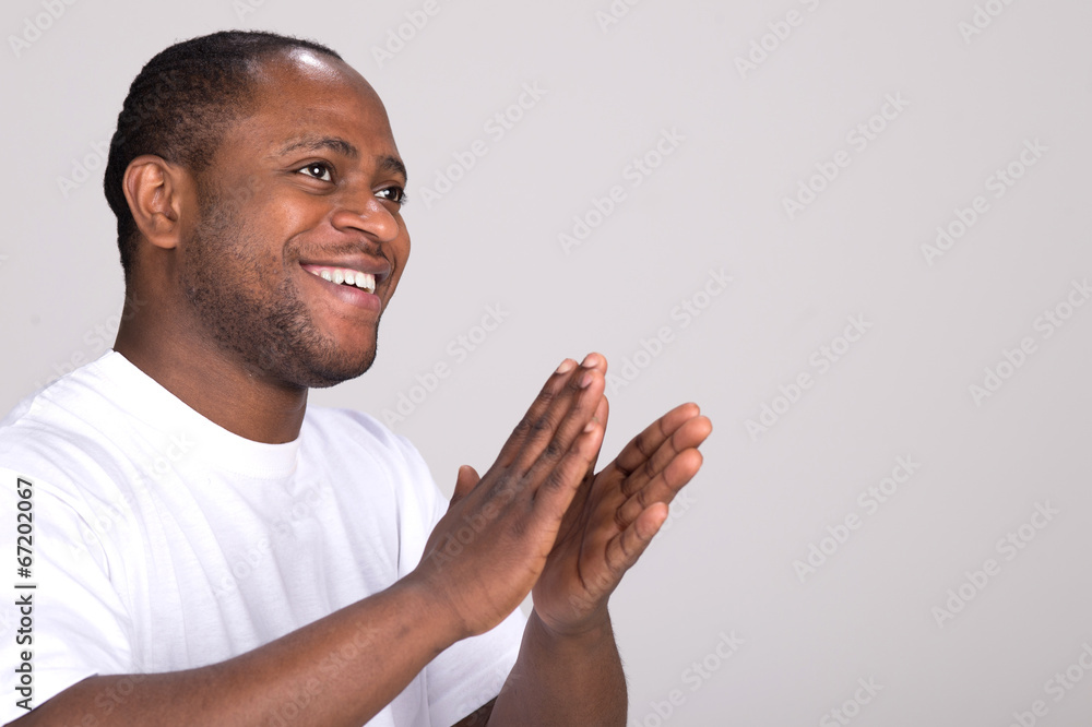 handsome black man clapping hands. Stock Photo | Adobe Stock