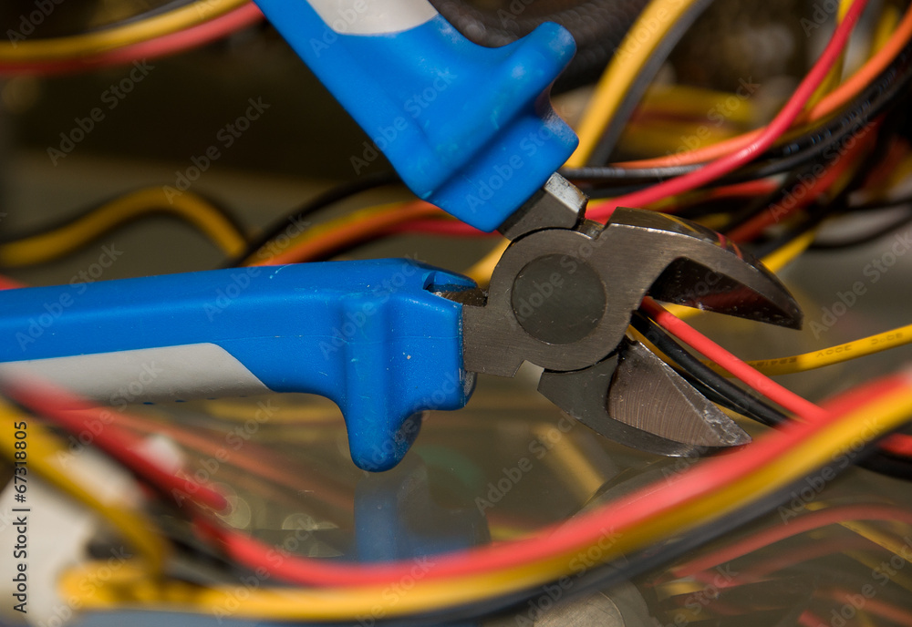 wire cutters cut the colorful cable Stock Photo | Adobe Stock