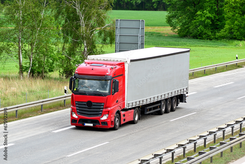 LKW auf Autobahn // Truck on highway Stock-Foto | Adobe Stock