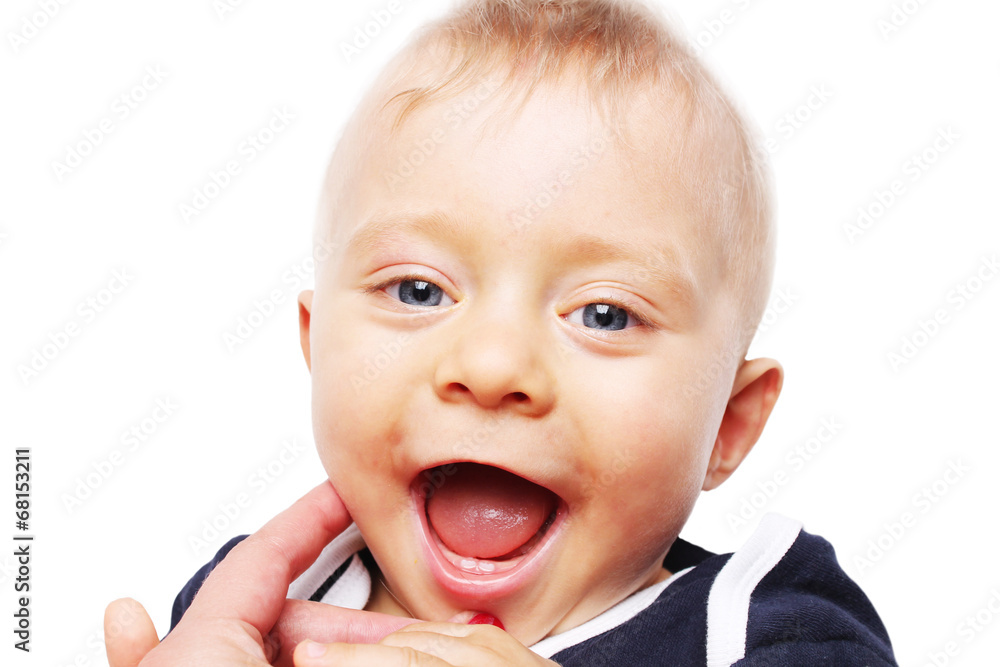 baby boy showing his first teeth Stock Photo | Adobe Stock