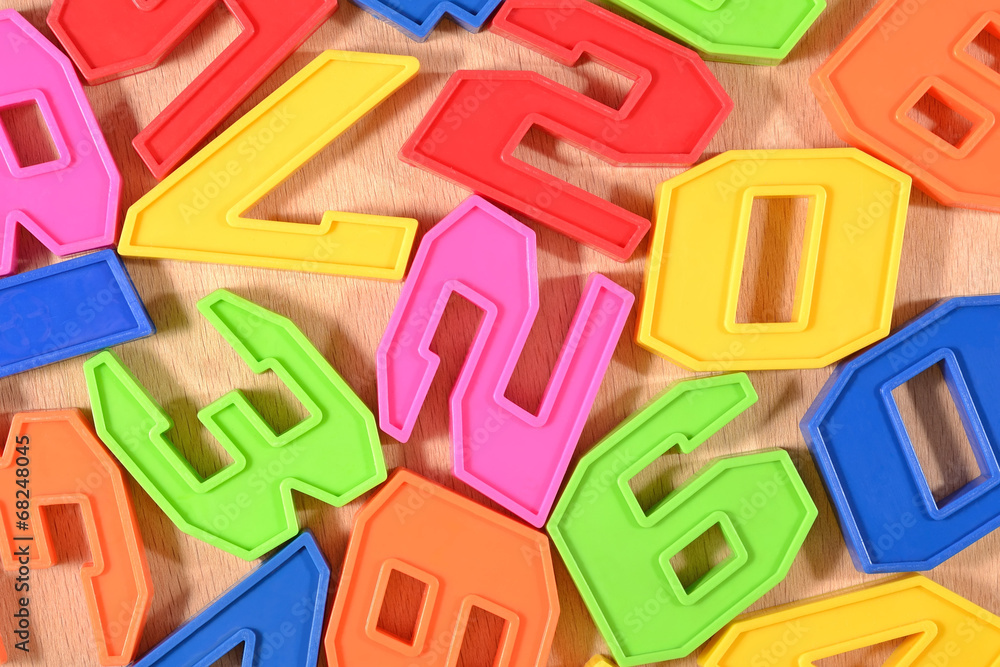 Colorful plastic numbers. Stock Photo | Adobe Stock