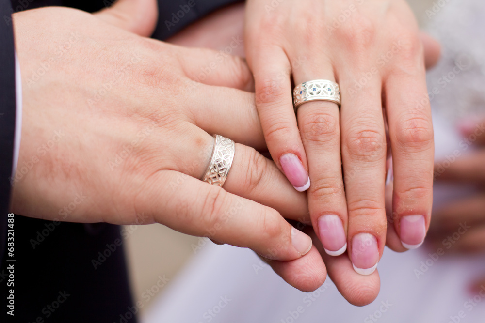 Hands with wedding rings Stock Photo | Adobe Stock