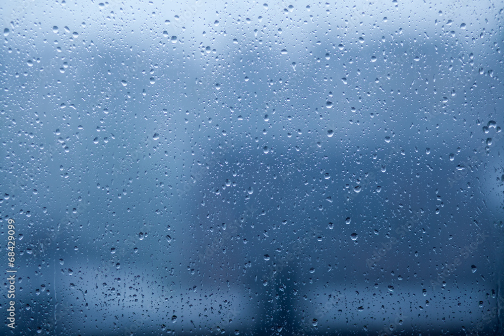 City view through a window on a rainy day Stock Photo | Adobe Stock