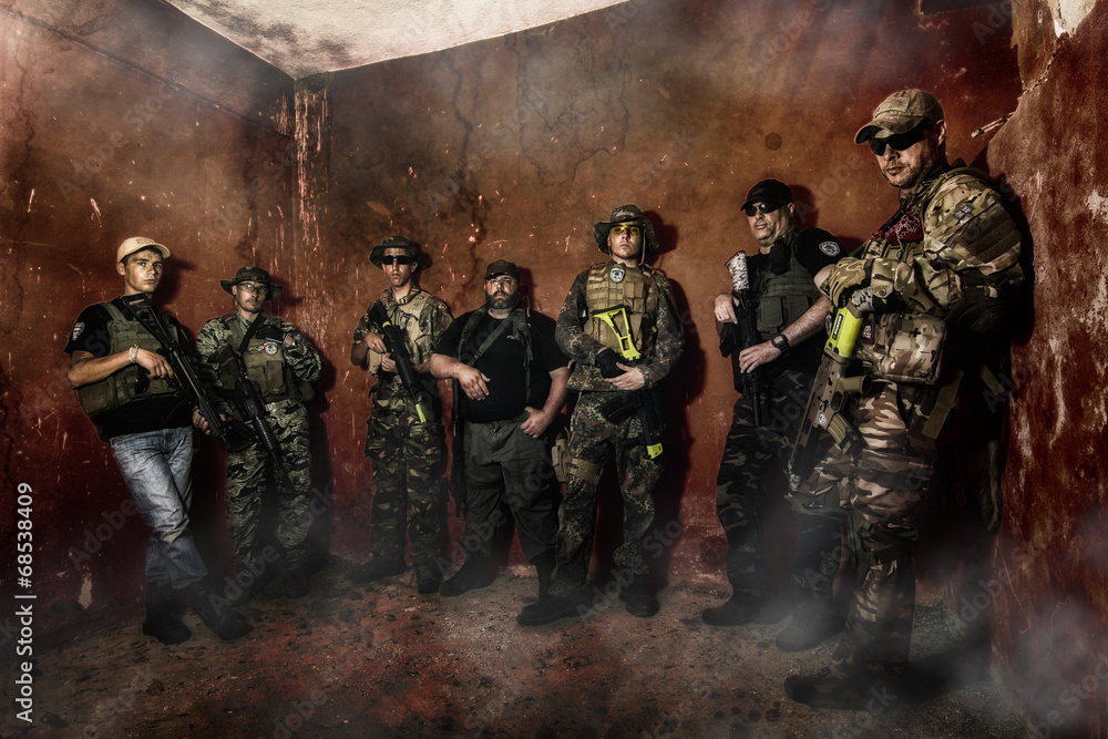 Airsoft group team in daytime action in pose Stock Photo | Adobe Stock