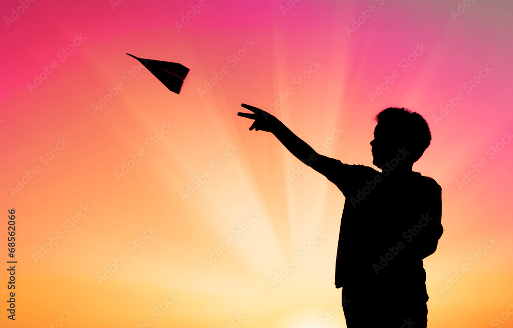 little boy throwing paper plane Stock Illustration | Adobe Stock