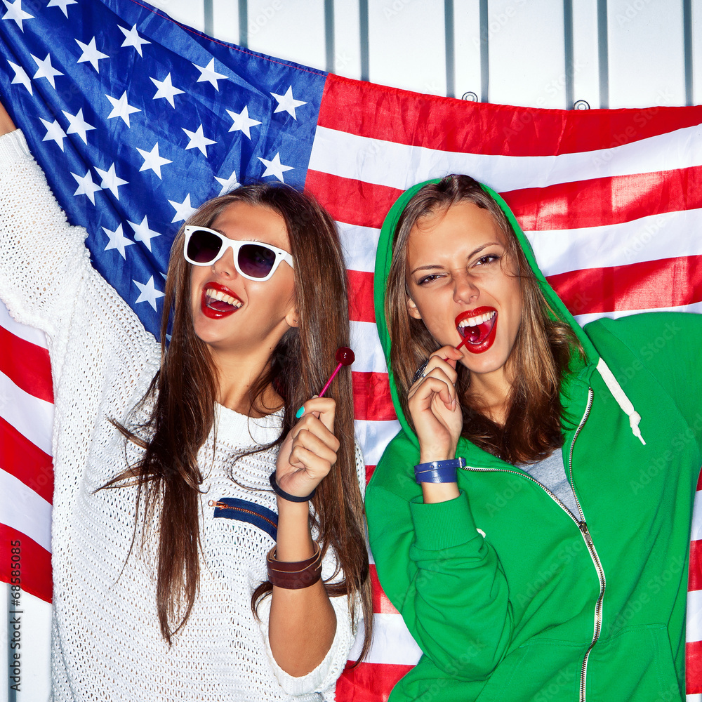 Beautiful patriotic girls with lollipop Stock Photo | Adobe Stock