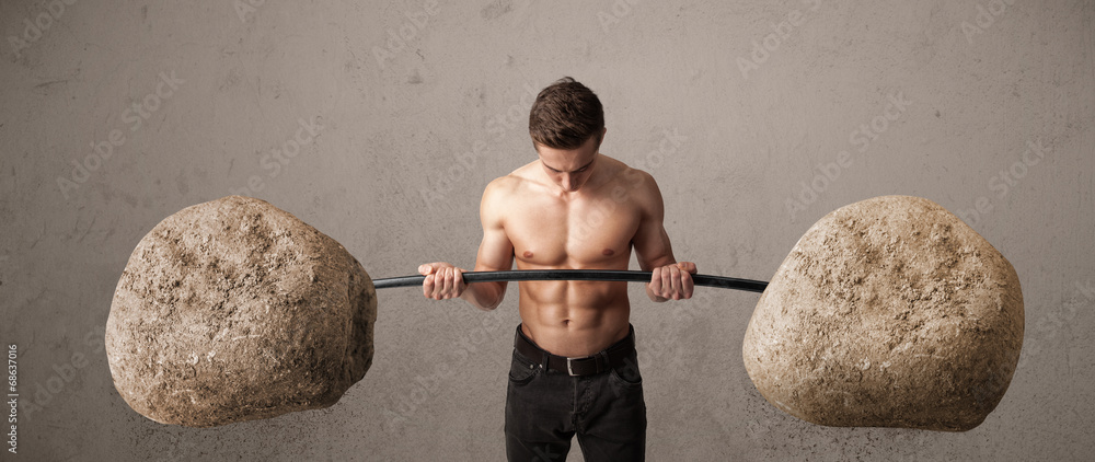 muscular man lifting large rock stone weights Stock Photo | Adobe Stock