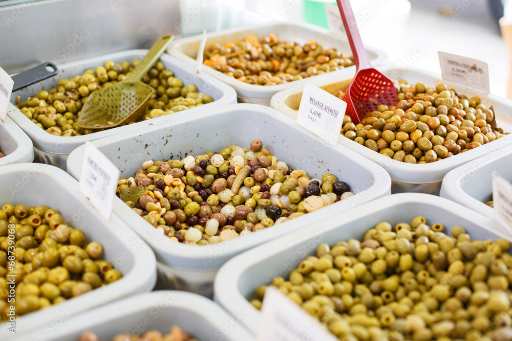 Different marinated olives on provencal street market in Provenc Stock ...