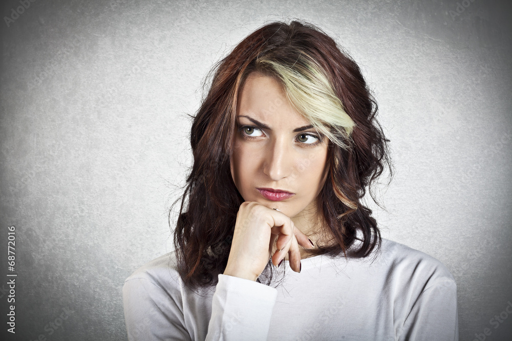 Doubtful girl Stock Photo | Adobe Stock