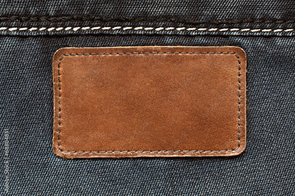Leather tag on jeans background Stock Photo | Adobe Stock