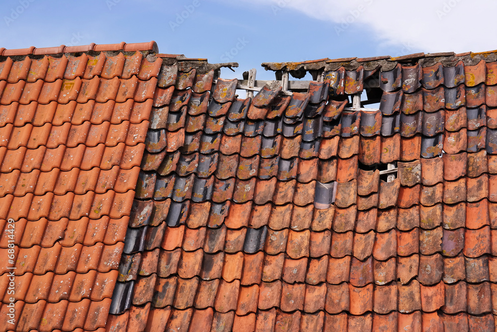Damaged tiled roof of an old Dutch house Stock Photo | Adobe Stock