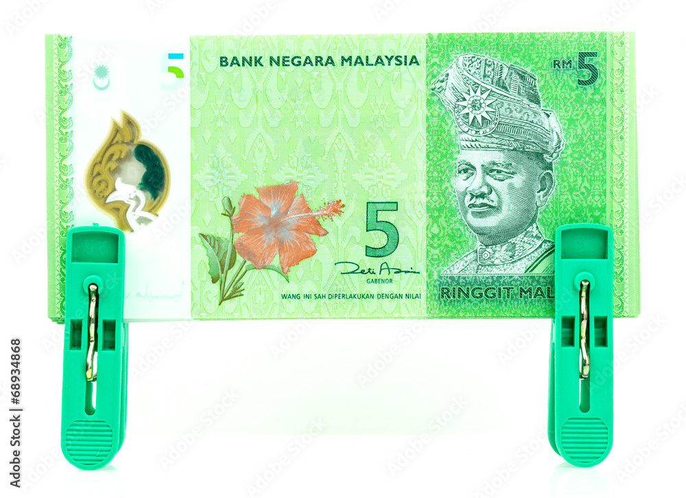 Five Malaysia Ringgit Currency Bank Notes on Pinchers Stock Photo ...
