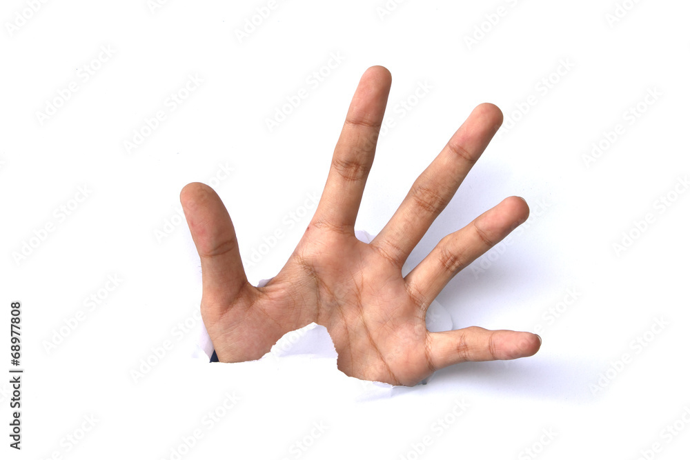 Image of human hand reaching out through torn paper Stock Photo | Adobe ...