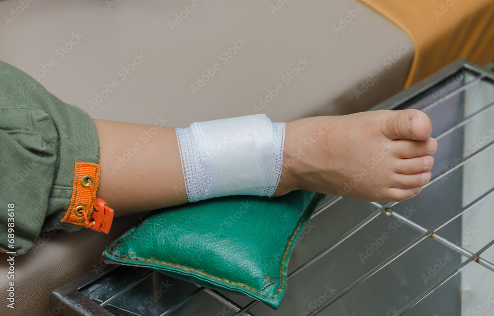 child boy with bandage on leg and lying down hospital bed Stock Photo ...