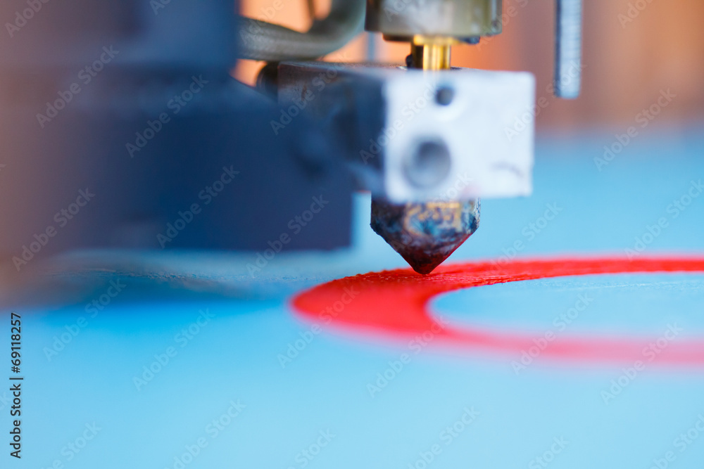 head of 3d printer in action Stock Photo | Adobe Stock