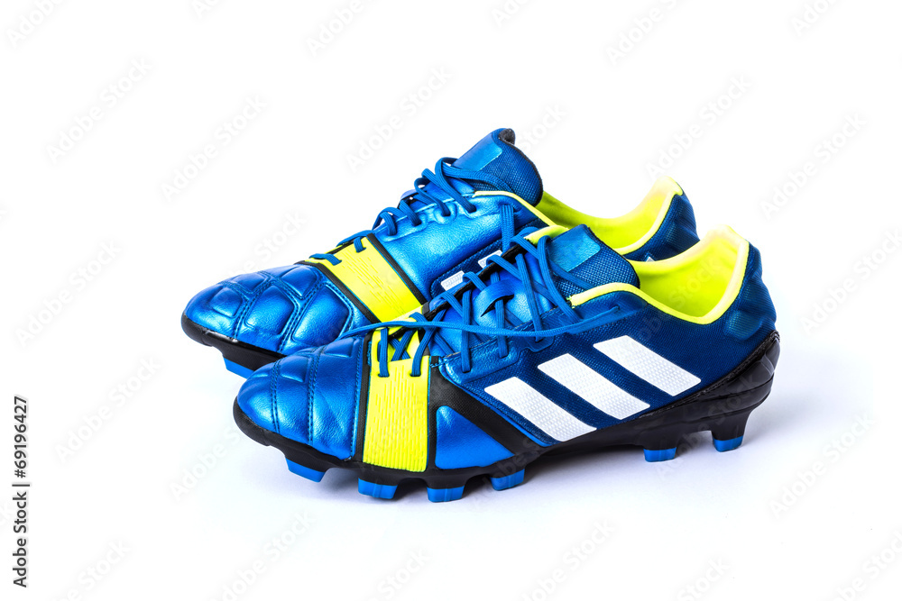 blue soccer shoes on white background Stock Photo | Adobe Stock