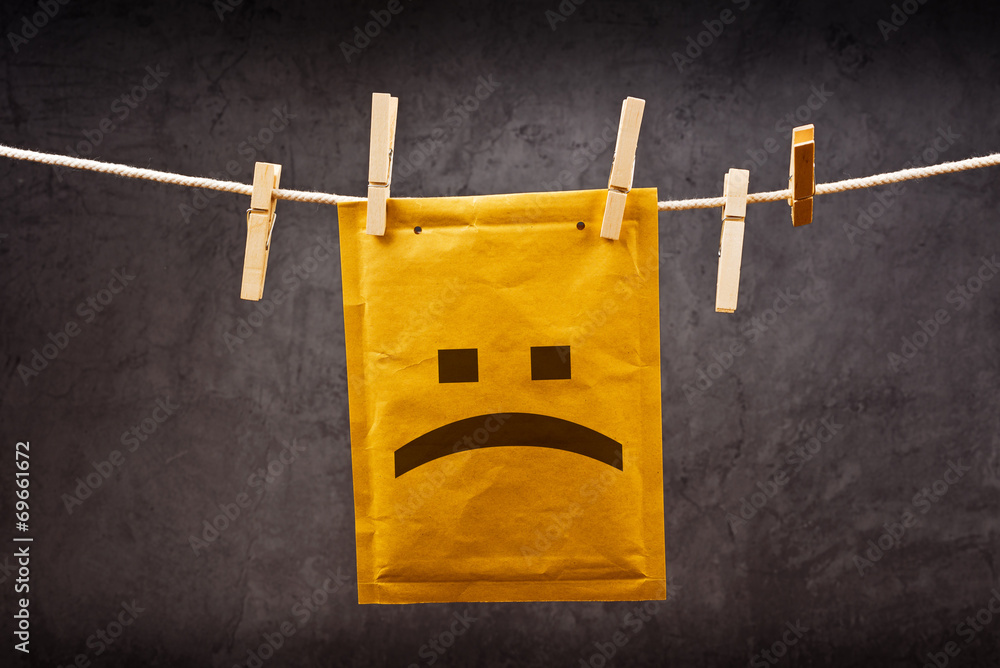 Sad face emoticon on mail Envelope Stock Photo | Adobe Stock