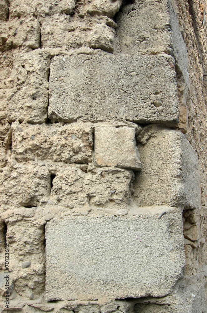 Particular edge wall of mud, straw bricks and concrete bricks Stock ...