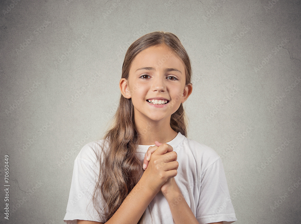 teenager girl gesturing with clasped hands, pretty please Stock Photo ...